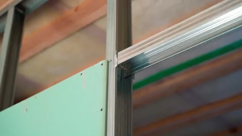 Moisture-resistant green drywall screwed... | Stock Video | Pond5