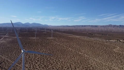 Mojave Wind Farm aerial pan left, then t... | Stock Video | Pond5