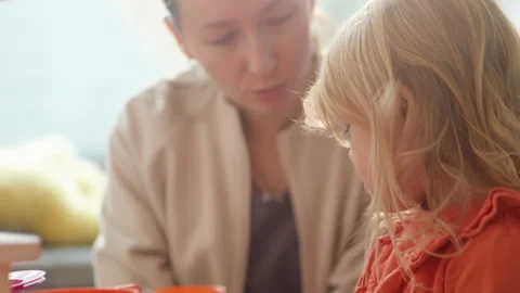 Mom and daughter performing role game ab... | Stock Video | Pond5