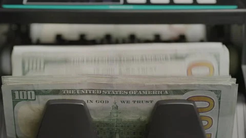 Money Counter Flipping a Stack of Hundre... | Stock Video | Pond5