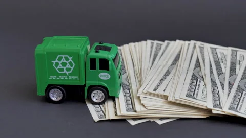 Money saved on recycling or money lost d... | Stock Video | Pond5