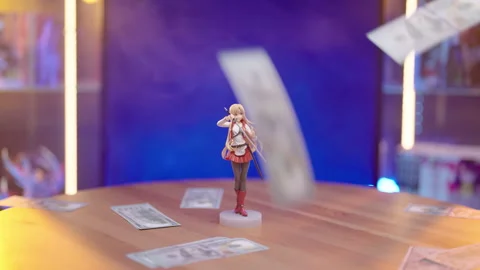Money throwing at anime girl figure coll... | Stock Video | Pond5