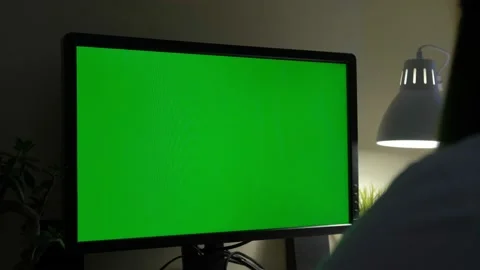Monitor with green screen. Dark office 4... | Stock Video | Pond5