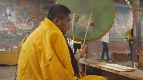 Monk Playing Drum During The Prayer Ritu... | Stock Video | Pond5