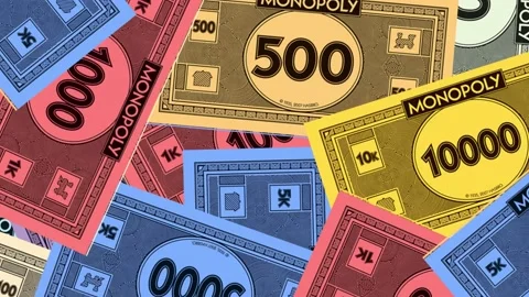 monopoly money background. colorful mono... | Stock Video | Pond5