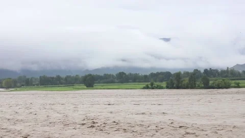 Monsoon rain cause heavy flood in river ... | Stock Video | Pond5