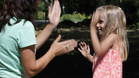 Mother and Child, Little Girl Playing Cl... | Stock Video | Pond5