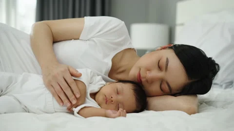 Mother and Daughter Sleeping Together Stock Video Footage | Royalty ...