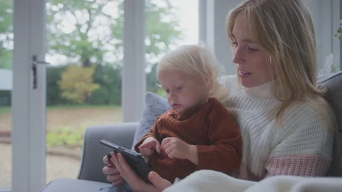 Mother And Son Looking At Smart Meter At... | Stock Video | Pond5