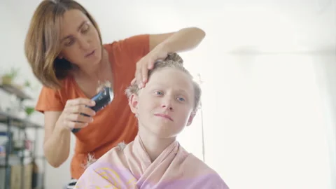 Long Hair Trimming Stock Videos – Royalty-Free HD & 4K Videos | Pond5