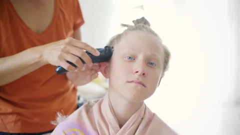 Long Hair Trimming Stock Videos – Royalty-Free HD & 4K Videos | Pond5