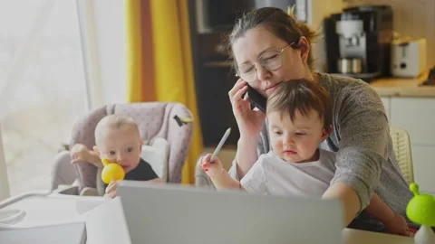 mother working from home remotely with b... | Stock Video | Pond5