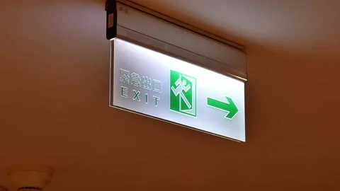 Motion of emergency exit sign on ceiling... | Stock Video | Pond5