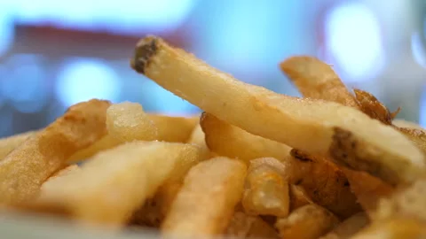 The motion of fries on the table at the ... | Stock Video | Pond5