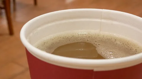 Motion of hot coffee on table at food co... | Stock Video | Pond5