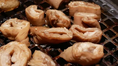 Motion of people cooking bbq pork intest... | Stock Video | Pond5