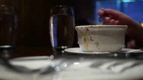 The motion of people eating soup inside ... | Stock Video | Pond5