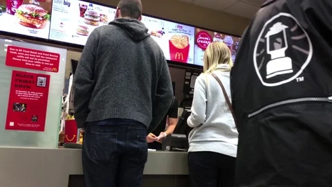 Motion of people ordering food at mcdona... | Stock Video | Pond5