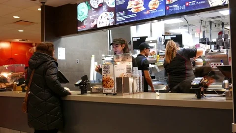 Motion of people ordering food at mcdona... | Stock Video | Pond5