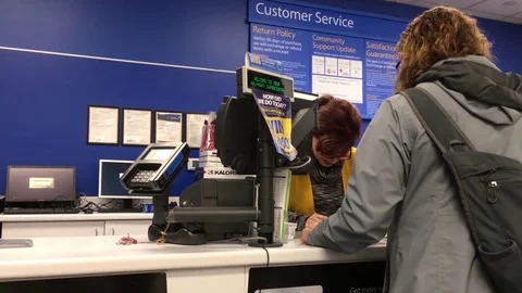Motion of people returning items at cust... | Stock Video | Pond5