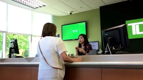 Motion of people talking to the teller i... | Stock Video | Pond5
