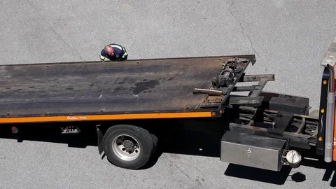 Motion of a tow truck operator inspectin... | Stock Video | Pond5