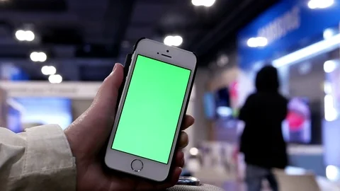 Motion of woman holding green screen pho... | Stock Video | Pond5