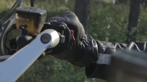 Motobike engine starting, hand rider on ... | Stock Video | Pond5