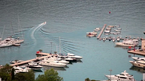 Motor boat riding from the mooring place... | Stock Video | Pond5