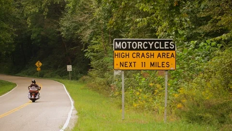 motorcycle pass warning crash area sign | Stock Video | Pond5