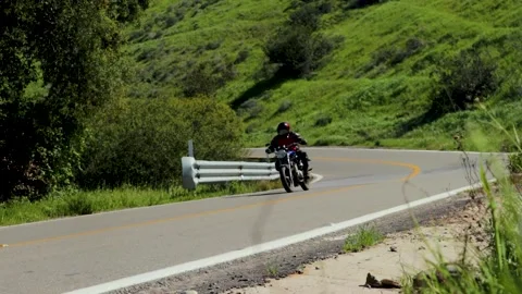 Motorcycle Sliding through a Curve on an... | Stock Video | Pond5