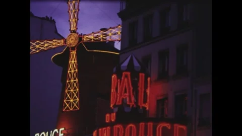 Moulin rouge neon sign lighting up at tw... | Stock Video | Pond5