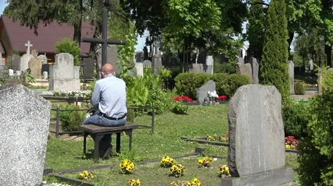 mourning husband man sit on bench near w... | Stock Video | Pond5