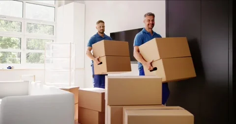 Movers Delivering Packaging Boxes | Stock Video | Pond5
