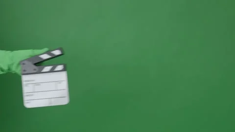 Movie Clapper board clapped by Hands on ... | Stock Video | Pond5