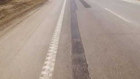 Moving on asphalt road. Back side view. | Stock Video | Pond5