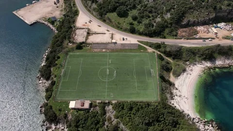 Moving away shot of Soccer field on clif... | Stock Video | Pond5