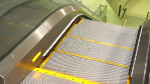 Moving escalator flashing warning light | Stock Video | Pond5