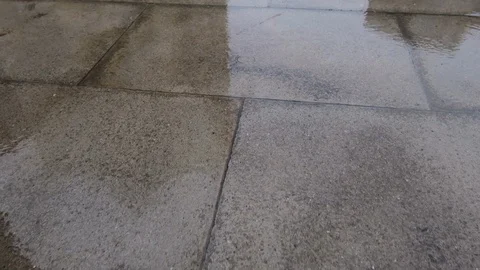 Moving forward over wet paving slabs on ... | Stock Video | Pond5
