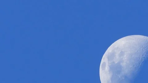 Moving moon on a blue background | Stock Video | Pond5