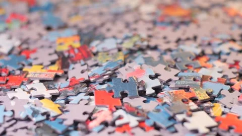 Moving Puzzle Pieces Falling On Pile in ... | Stock Video | Pond5
