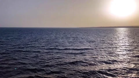 Moving on the sea with the sky and sunse... | Stock Video | Pond5