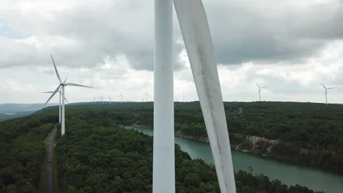 Moving top to bottom pan of a wind turbi... | Stock Video | Pond5