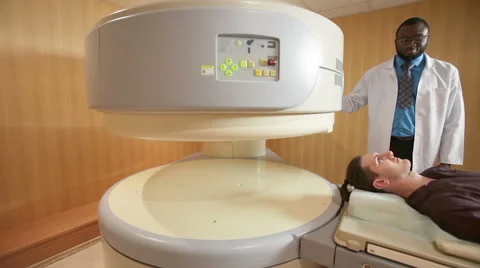 MRI assistant performing mri scan | Stock Video | Pond5