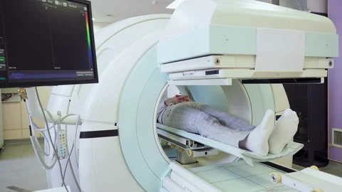 MRI diagnosis of adult man in hospital | Stock Video | Pond5
