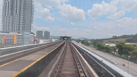 MRT train moving on an elevated track fr... | Stock Video | Pond5