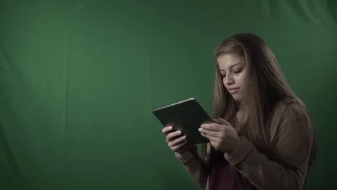 MS Green Screen Woman working on Tablet | Stock Video | Pond5