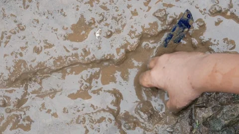 Mud covered hands of a child. Children ... | Stock Video | Pond5
