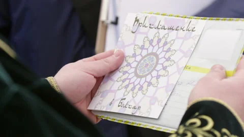 Mullah in traditional clothes extend inv... | Stock Video | Pond5