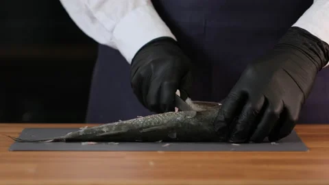 Mullet fish. Peel mullet fish from scale... | Stock Video | Pond5